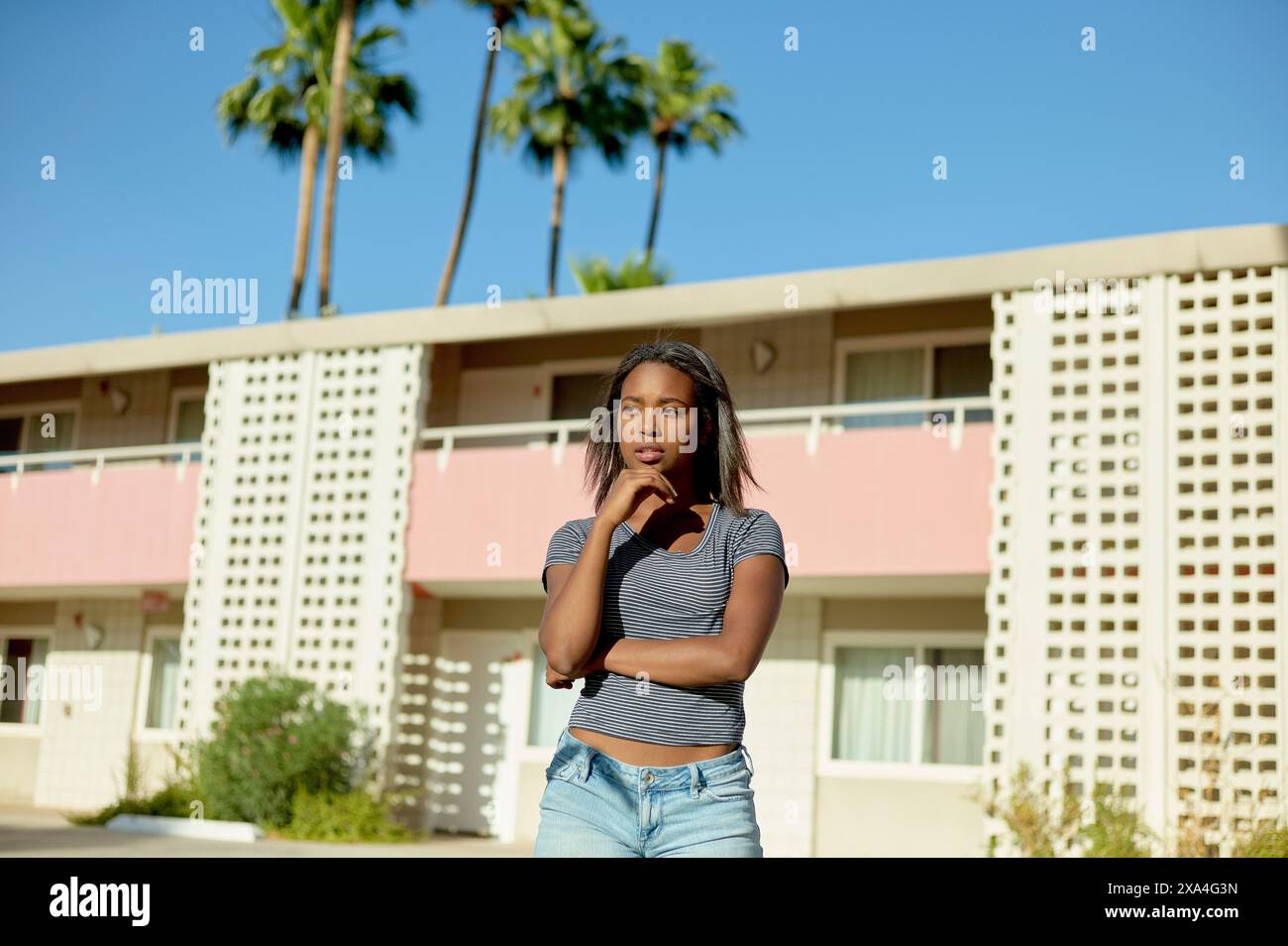 Focused woman in blue shirt hi-res stock photography and images - Alamy