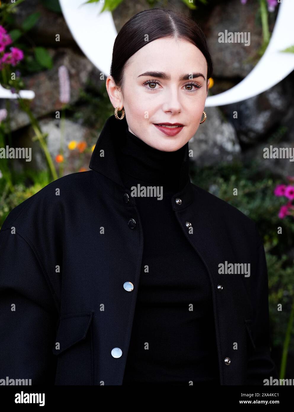 Lily Collins attends the Dior Cruise 2025 show at Drummond Castle ...