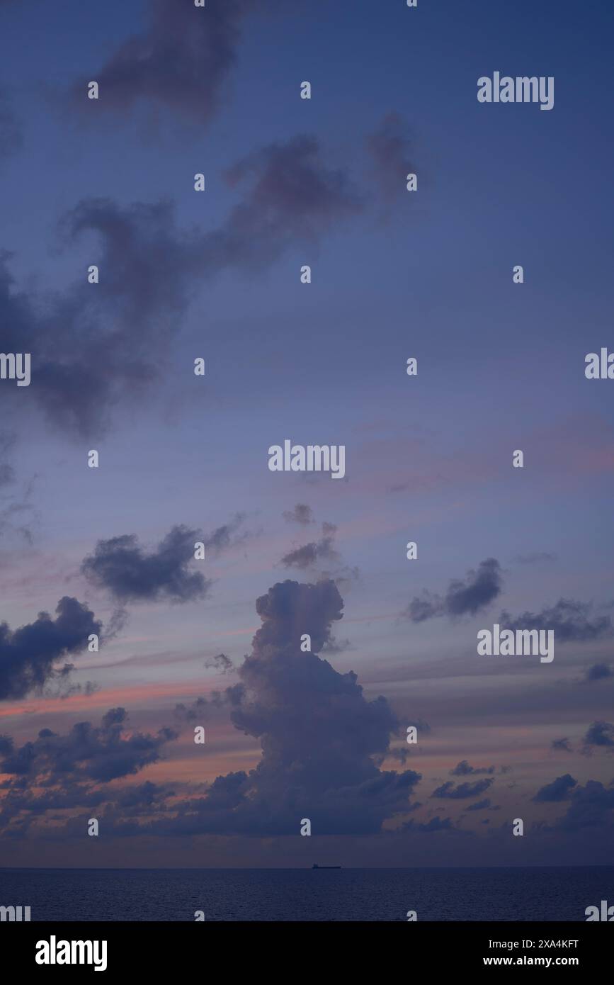 Showcasing silhouette ship horizon beneath impressive cumulus clouds hi ...