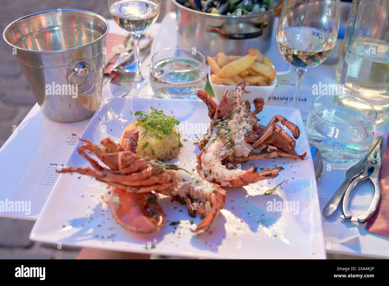 Menu visible under plate hi-res stock photography and images - Alamy