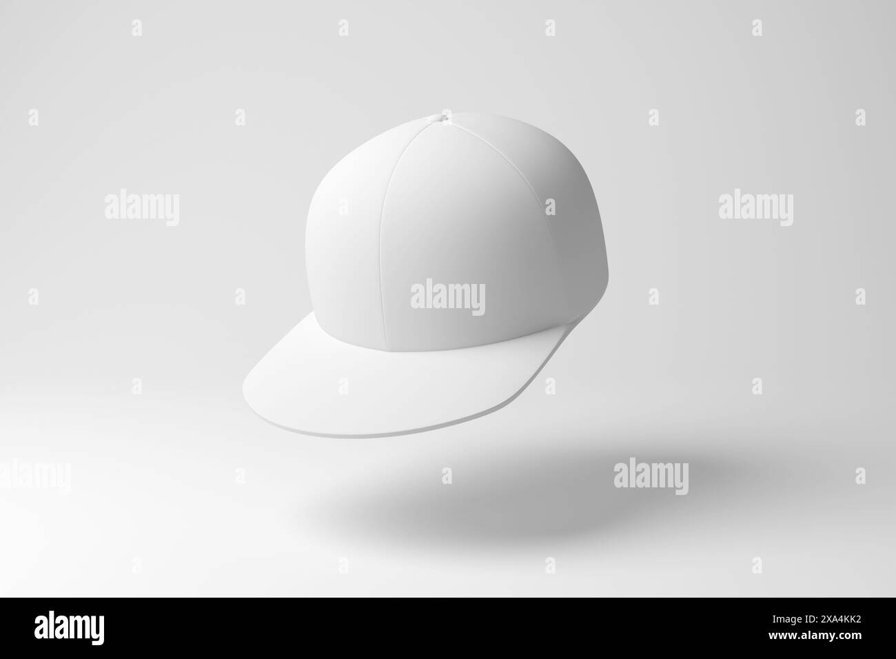 White snapback cap floating in mid air on white background in ...