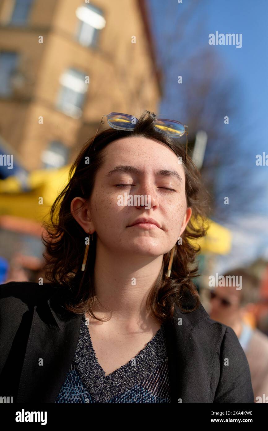 Relaxed woman closed eyes stands hi-res stock photography and images ...