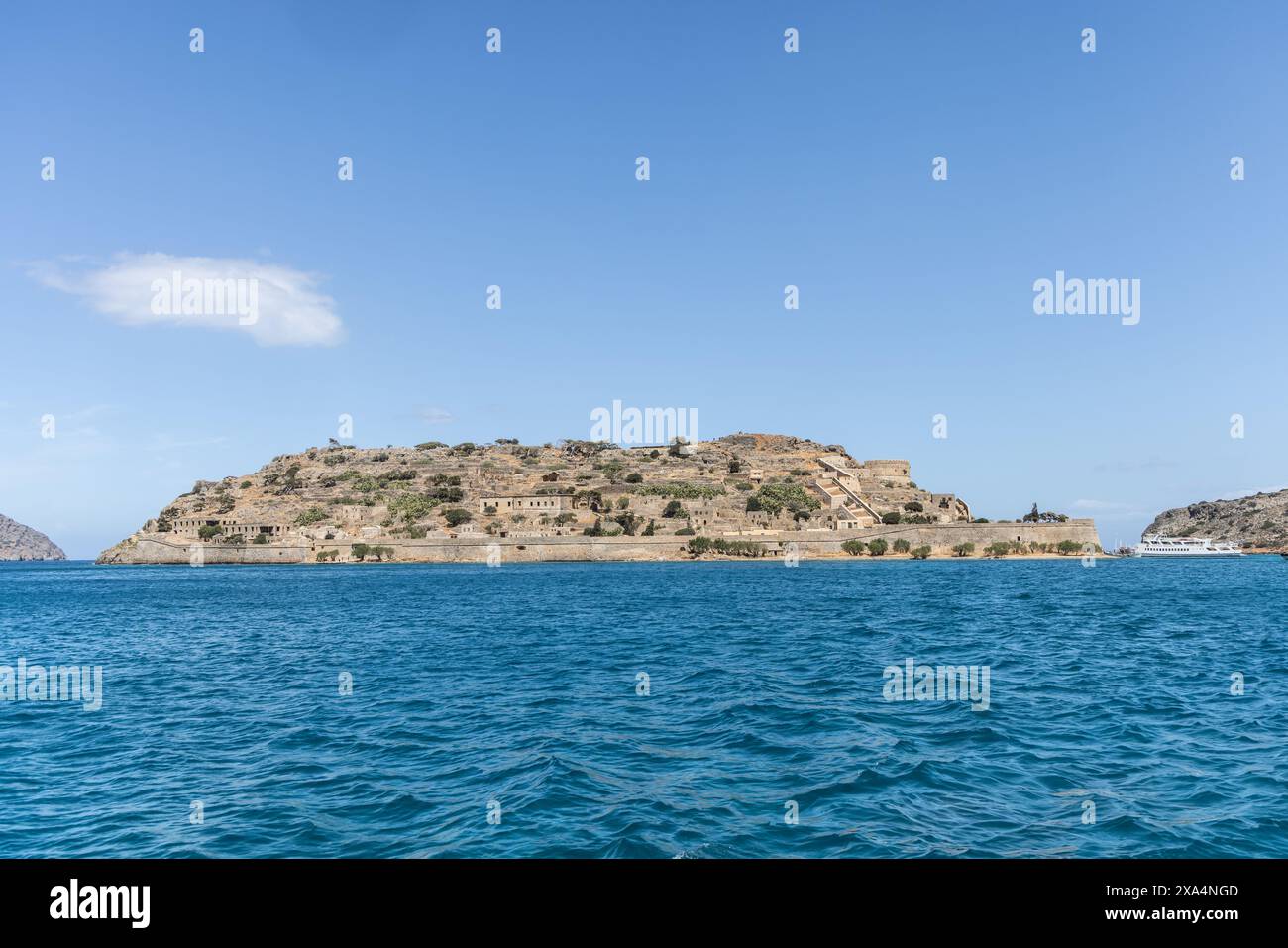 The island of Spinalonga in the distance seen from the heights of ...