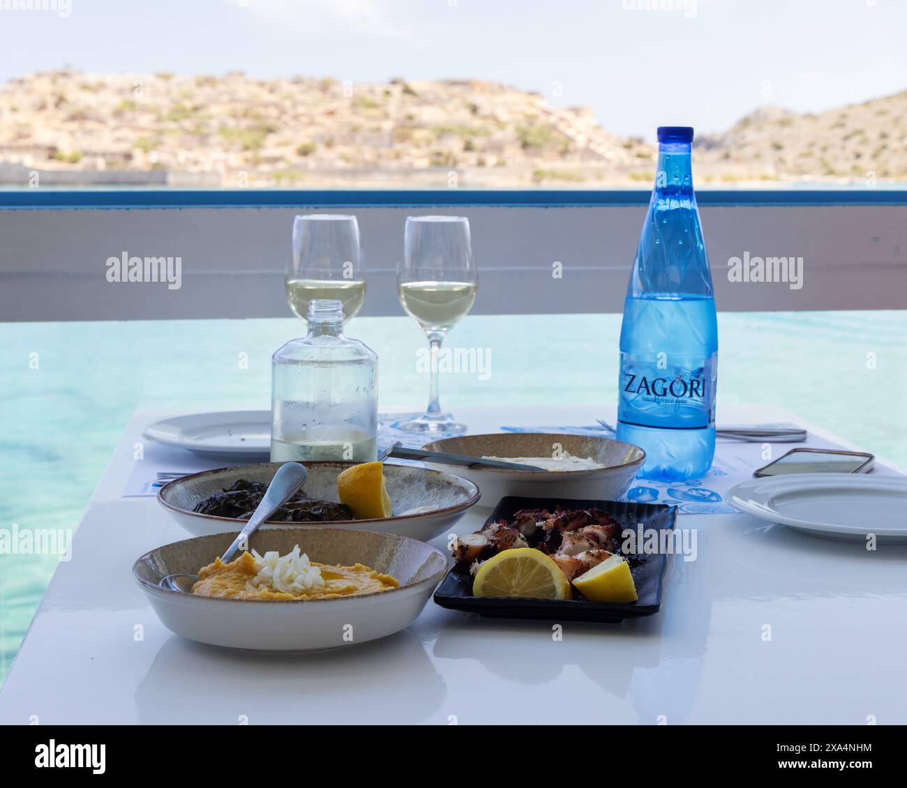 A lunch of grilled octopus, fava, and dolmades at Plaka in Crete with ...