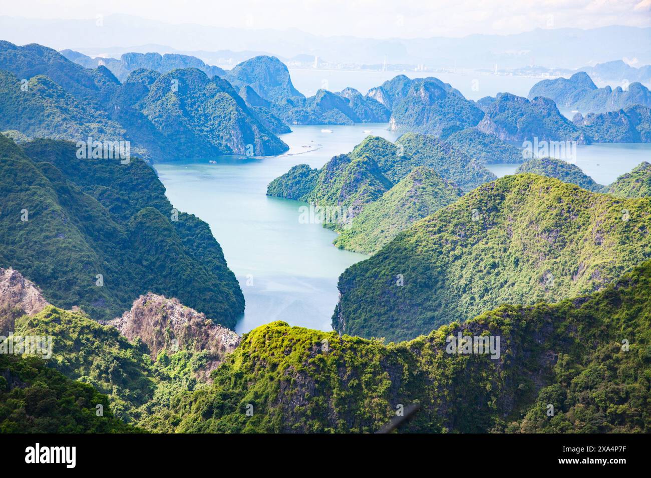 Ha Long Bay from Cat Ba island, Ha Long city in the background, UNESCO ...