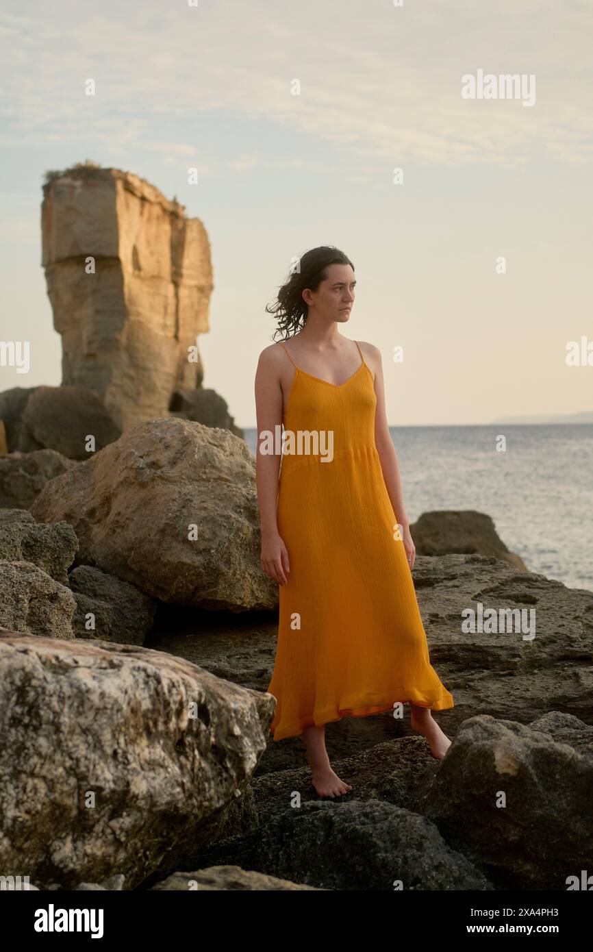 Large rock formation background during sunset hi-res stock photography ...