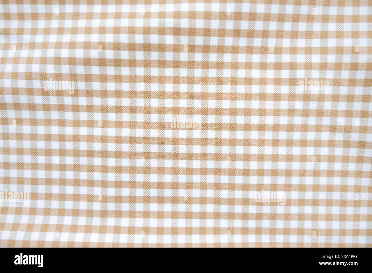 Beige and white checkered fabric pattern Stock Photo - Alamy