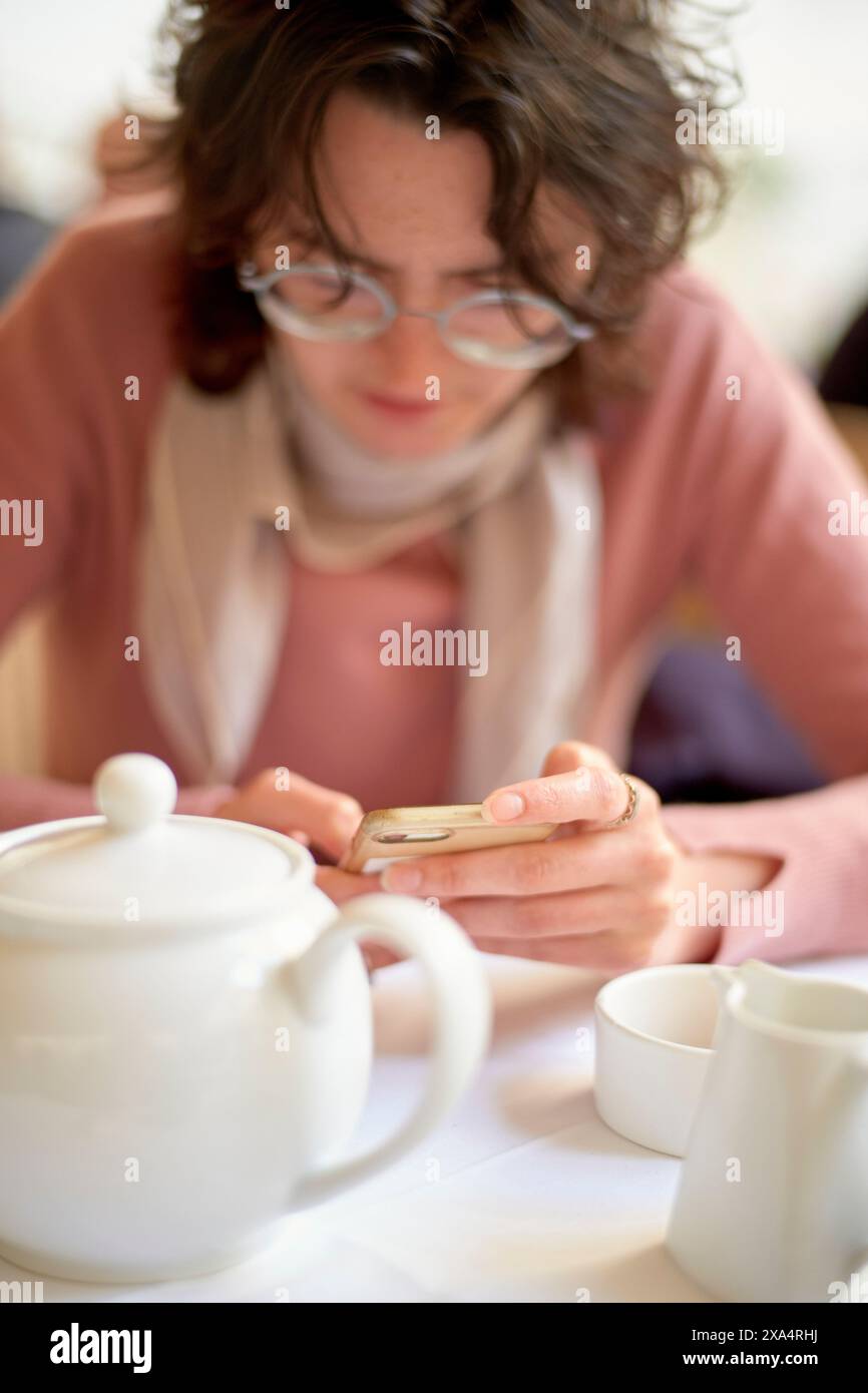 Woman in cafe intently hi-res stock photography and images - Alamy
