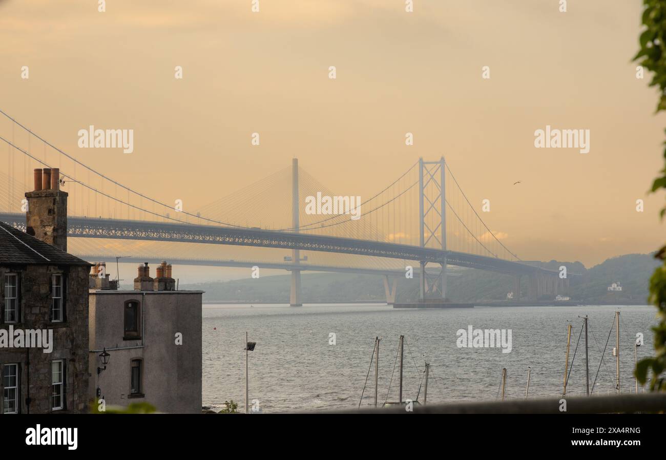 The Forth Road and Queensferry Crossing bridges span the the Firth of ...