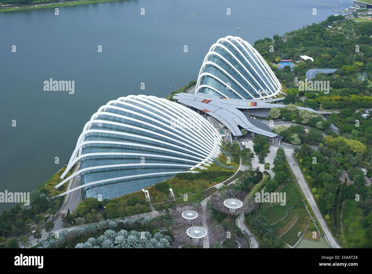 Aerial view distinctive dome shaped glass buildings by waterfront hi ...