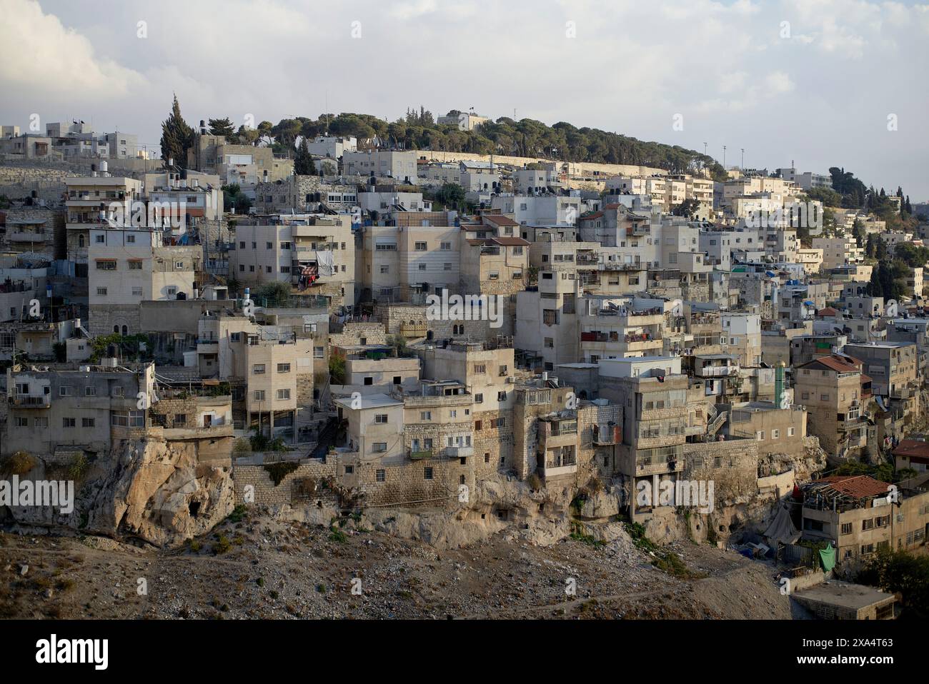 A panoramic view of densely packed residential buildings on a hillside ...