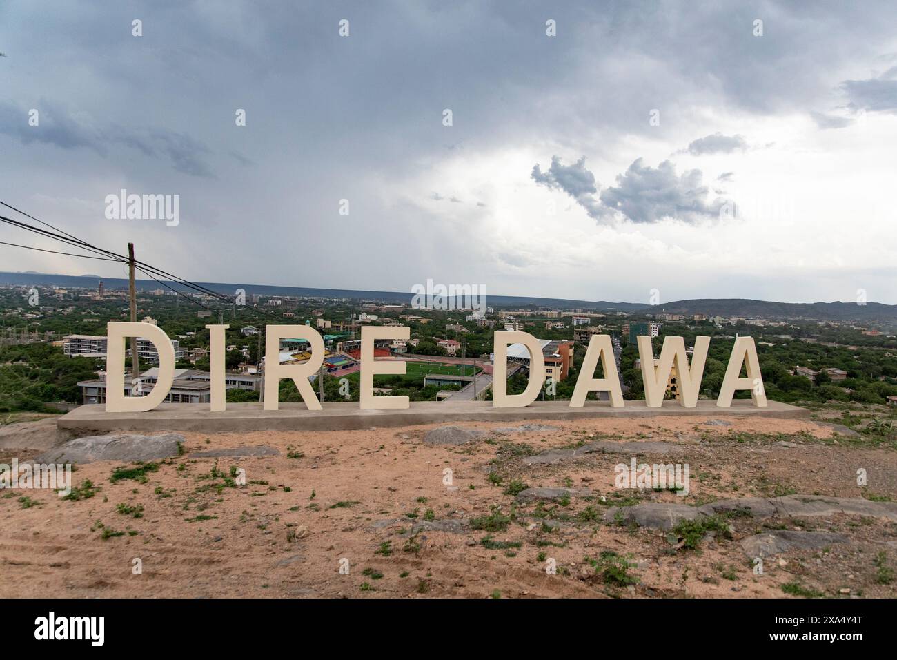 Sign with the words Dire Dawa, over the city of Dire Dawa in Ethiopia Stock Photo - Alamy