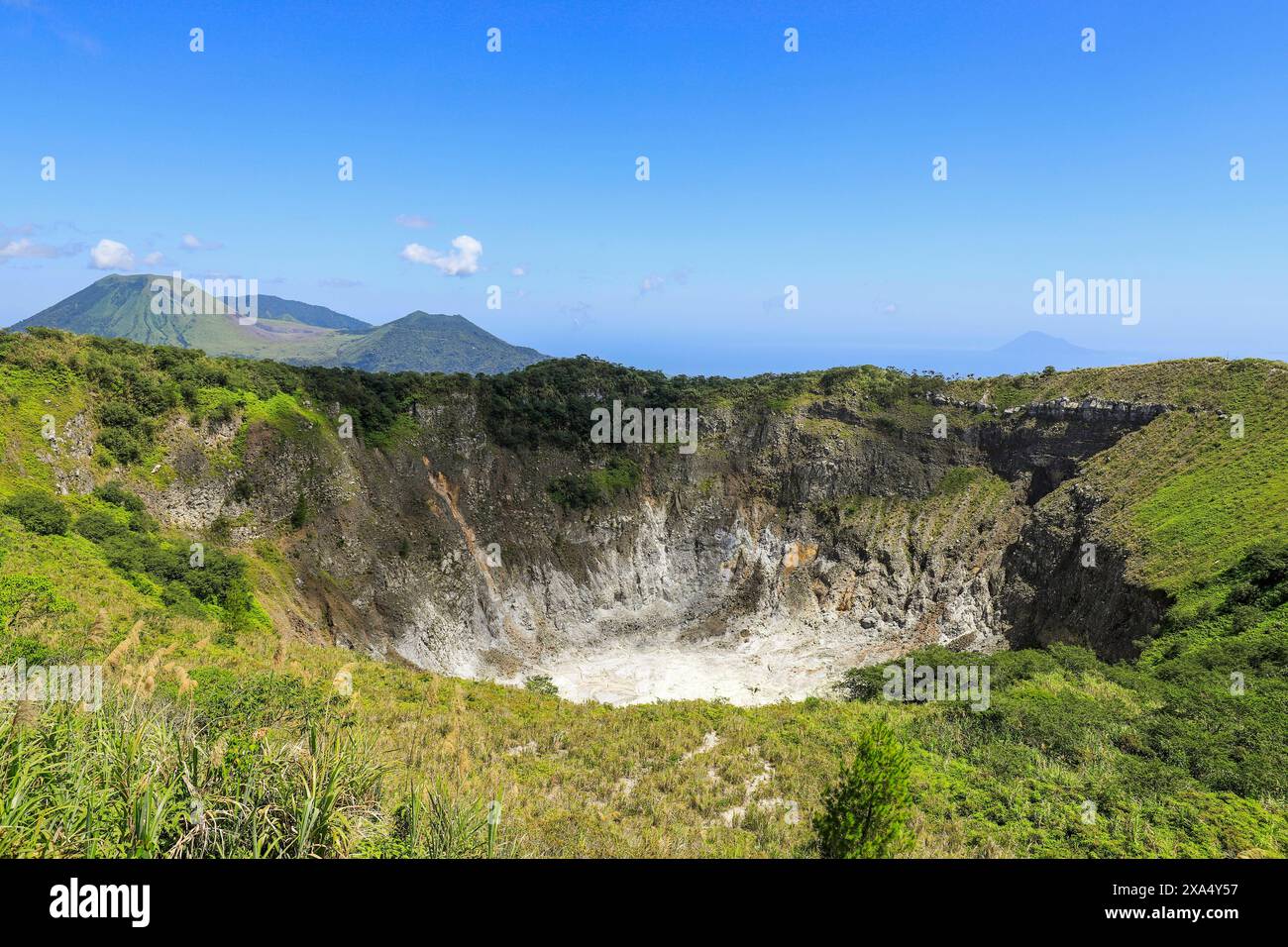 Mount Mahawu, a stratovolcano and active 180m wide crater, with Lokon ...