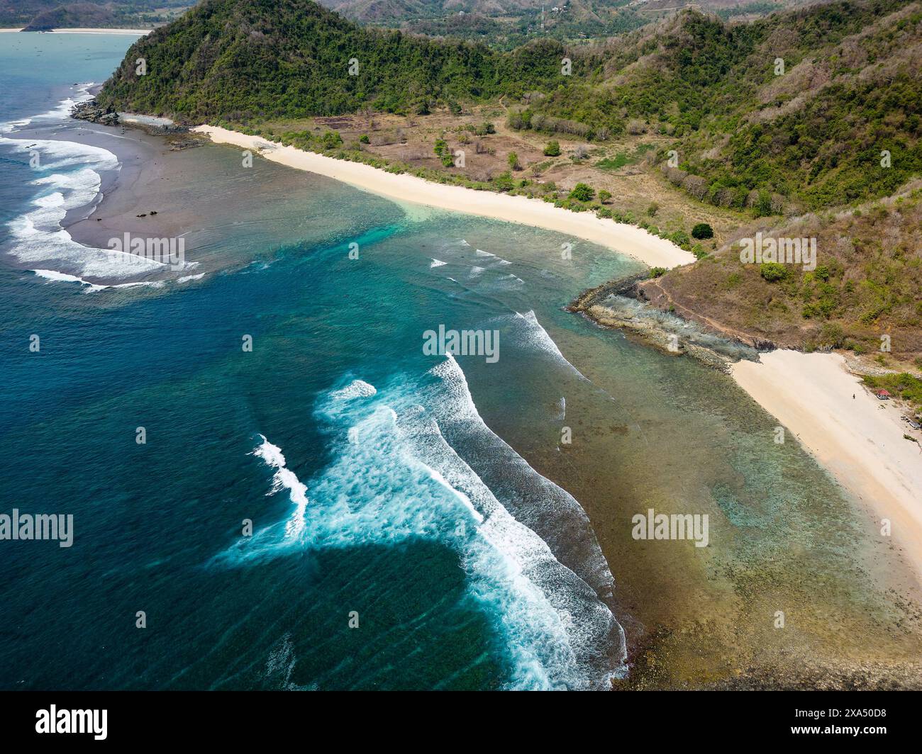 Aerial view of 2 beautiful, deserted tropical beaches and coral reef ...