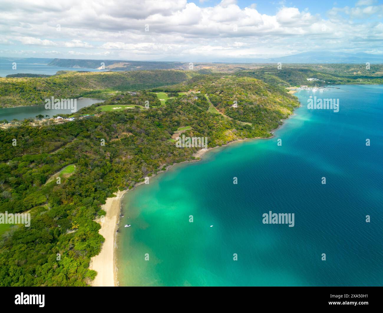 An aerial view of Guanacaste's lush green forests surrounding the Gulf ...