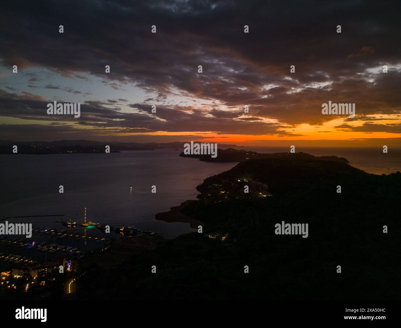 An aerial view of sunset over Gulf of Nicoya, Guanacaste, Costa Rica ...