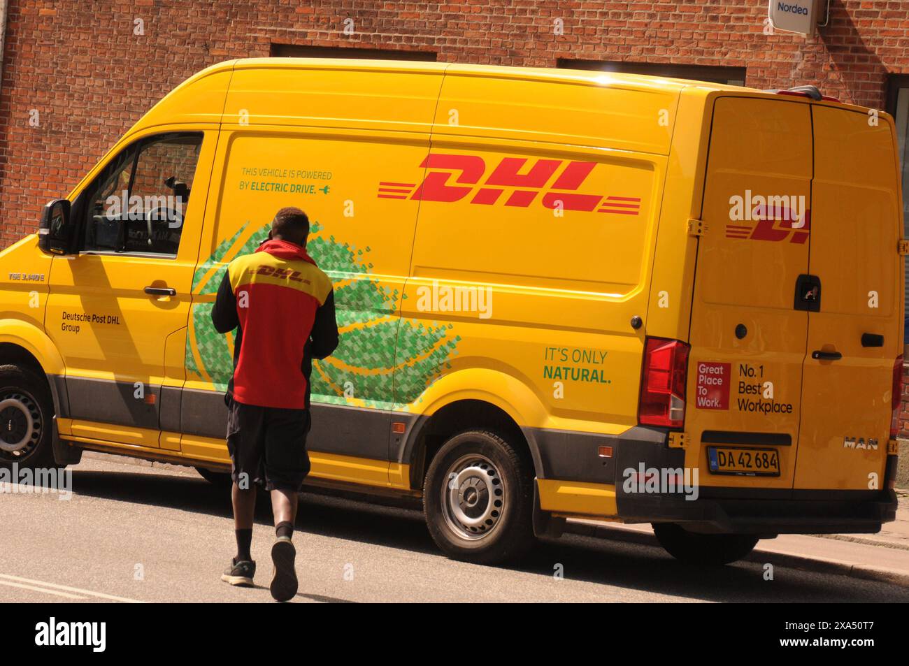 Copenhagen/ Denmark/04 jUNE 2024/Deutsche post DHL delivery van in ...