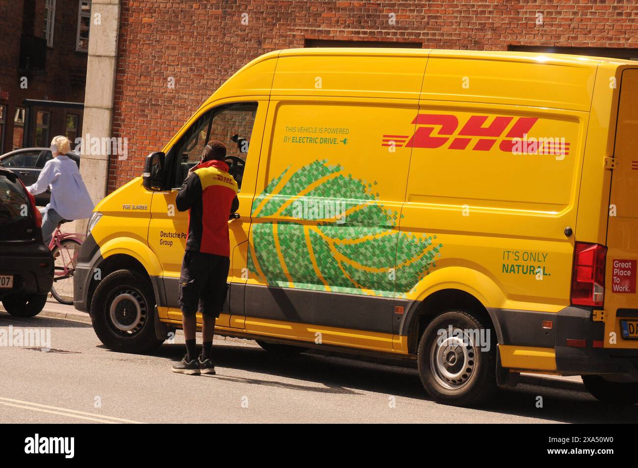 Copenhagen/ Denmark/04 jUNE 2024/Deutsche post DHL delivery van in ...