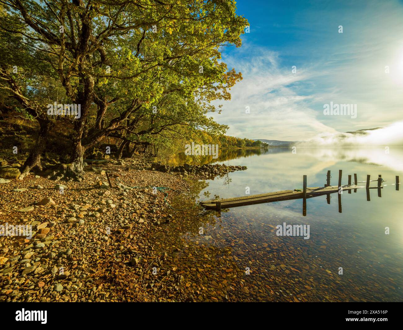 Serene lakeside view misty horizon hi-res stock photography and images - Alamy