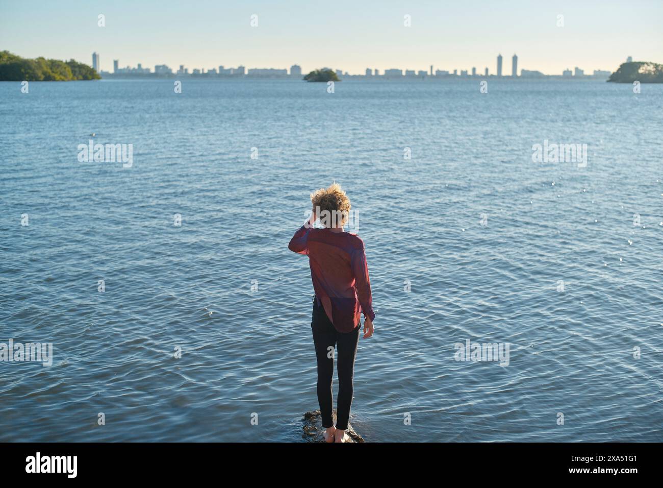 Person stands edge serene hi-res stock photography and images - Alamy