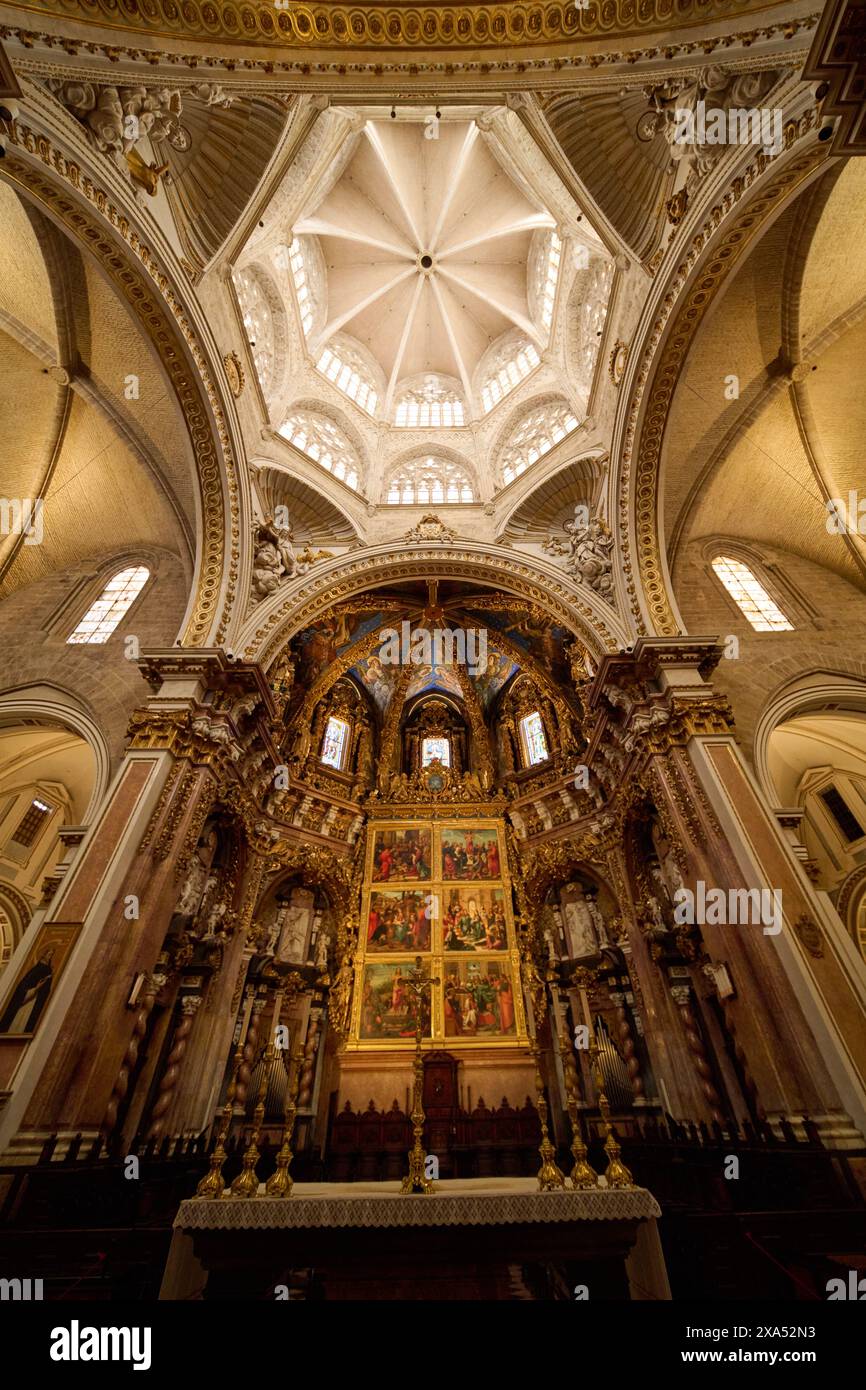 The interior of Valencia Cathedral, Spain, with an ornate altar Stock ...