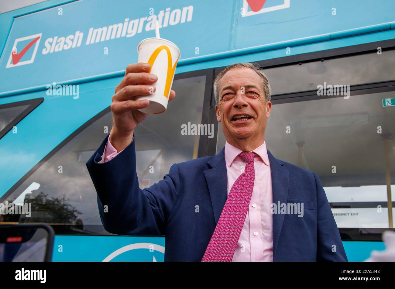 London, UK. 4th June, 2024. Nigel Farage drinks a banana milkshake ...