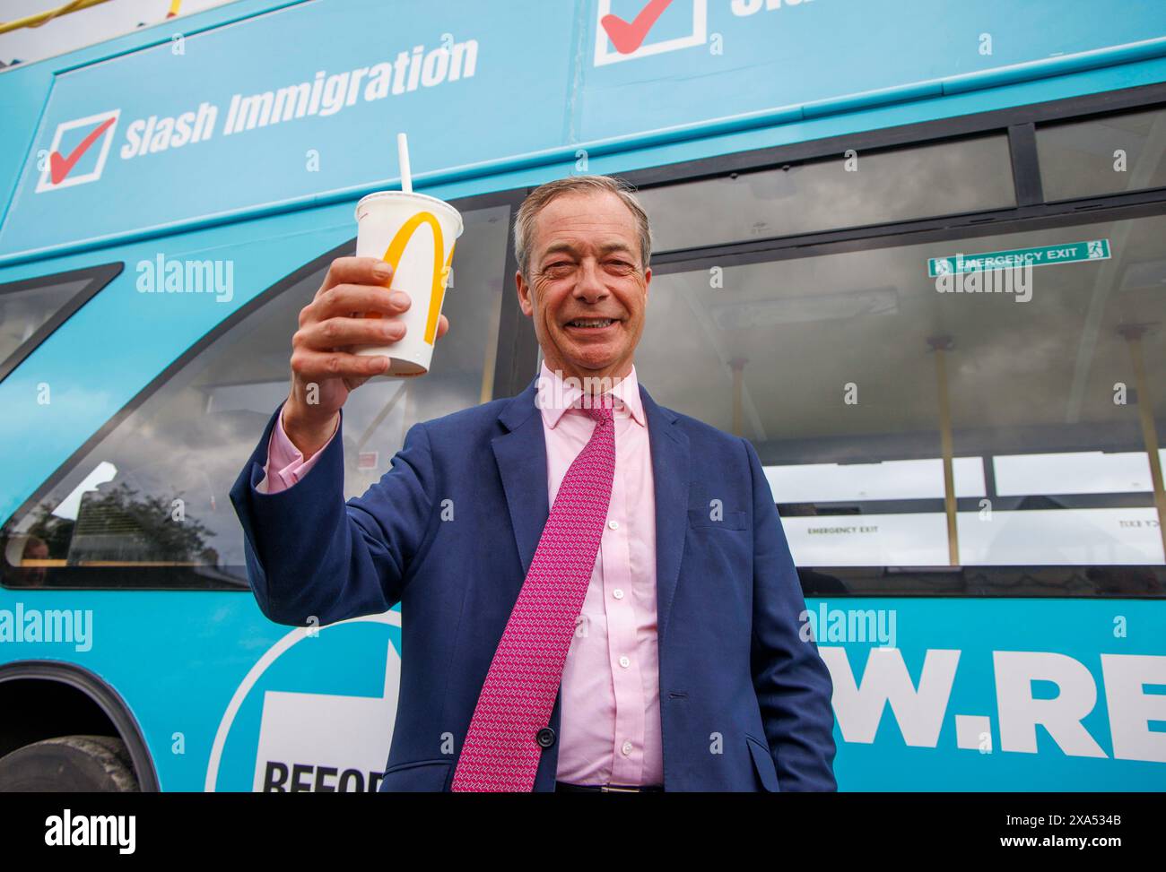 London, UK. 4th June, 2024. Nigel Farage drinks a banana milkshake ...