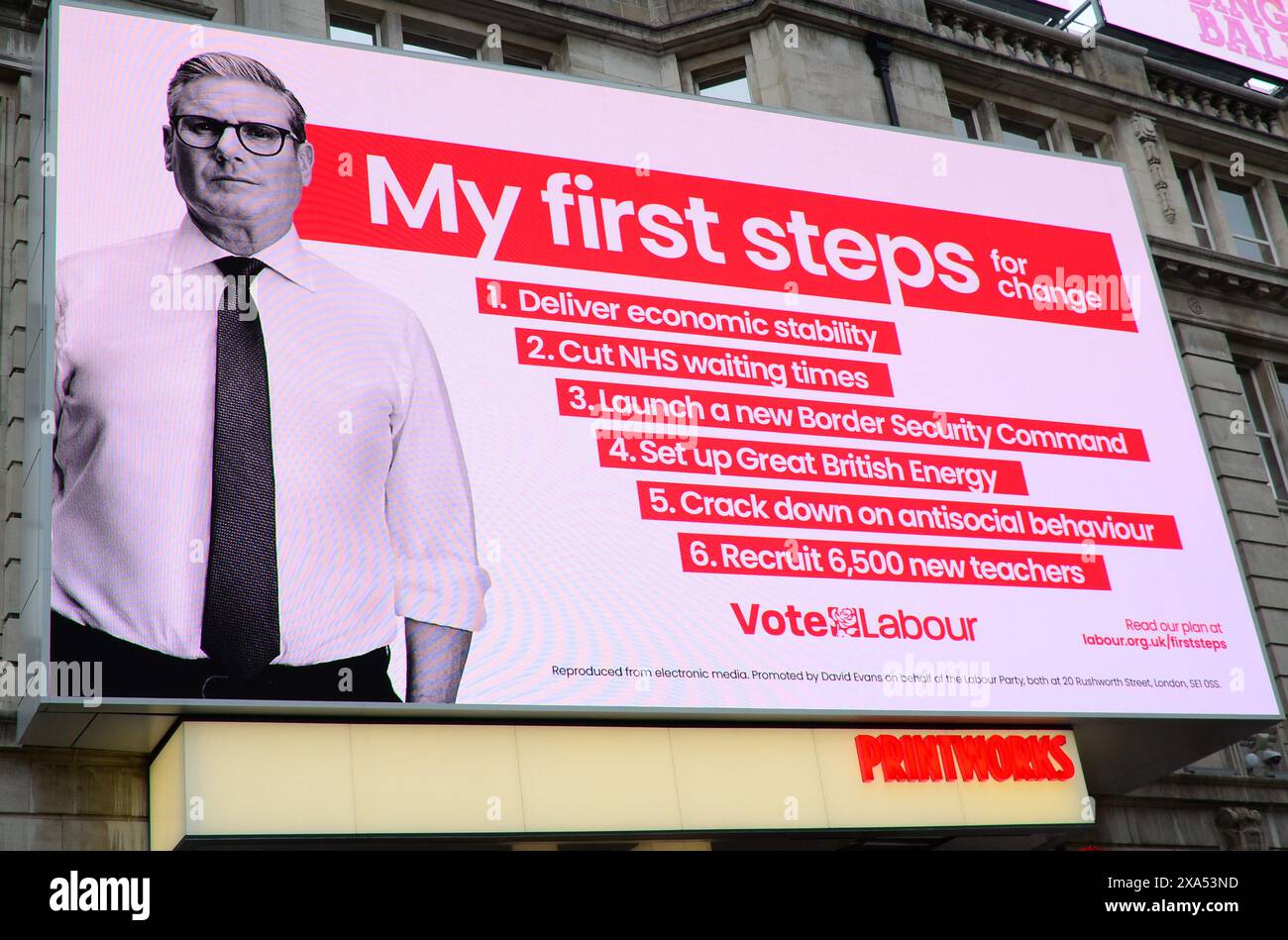 Electronic billboard in Manchester, UK, lists Labour Party 'my first ...