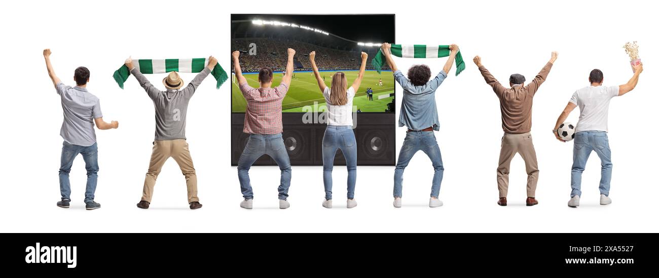 Rear view shot of a group of people cheering and watching football on a ...