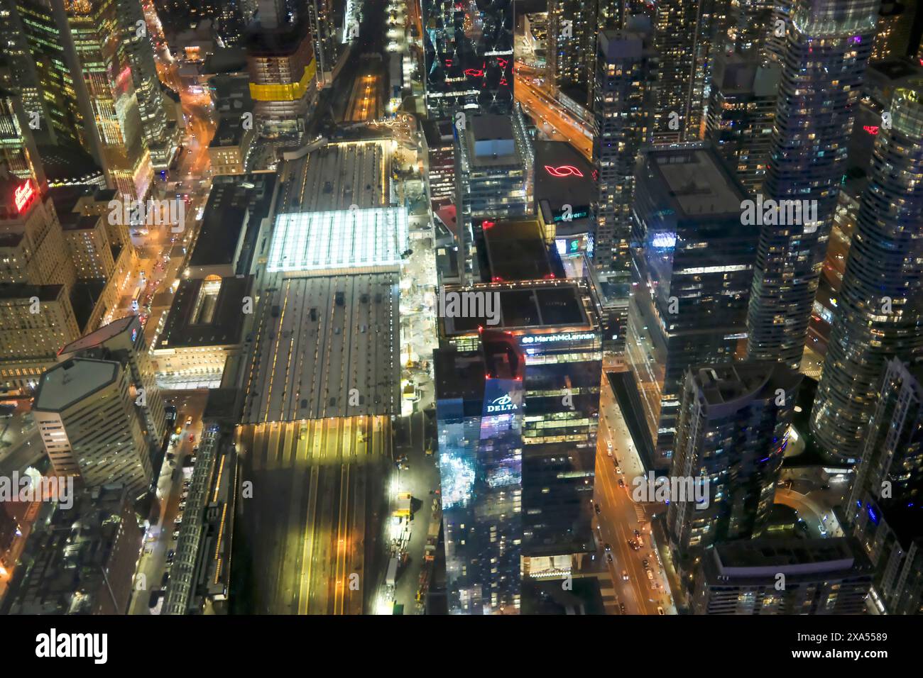 An aerial view of city lights and buildings at night Stock Photo - Alamy