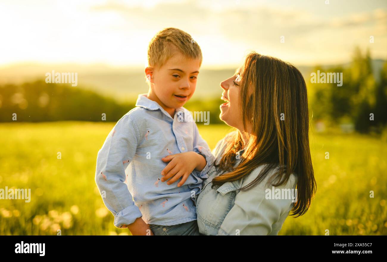 Nice mother and child Playing on great field at Sunset Stock Photo - Alamy