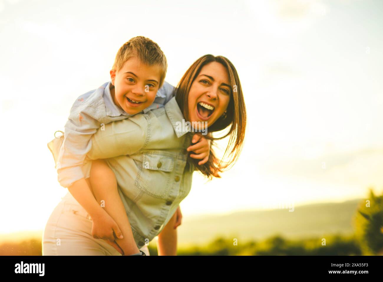 Nice mother and child Playing on great field at Sunset Stock Photo - Alamy