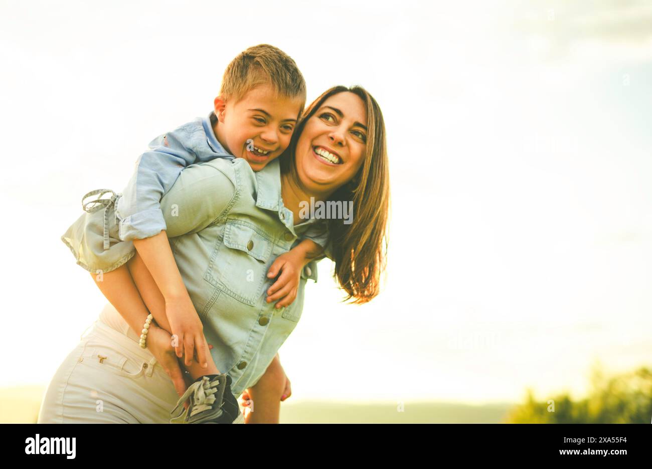 Nice mother and child Playing on great field at Sunset Stock Photo - Alamy