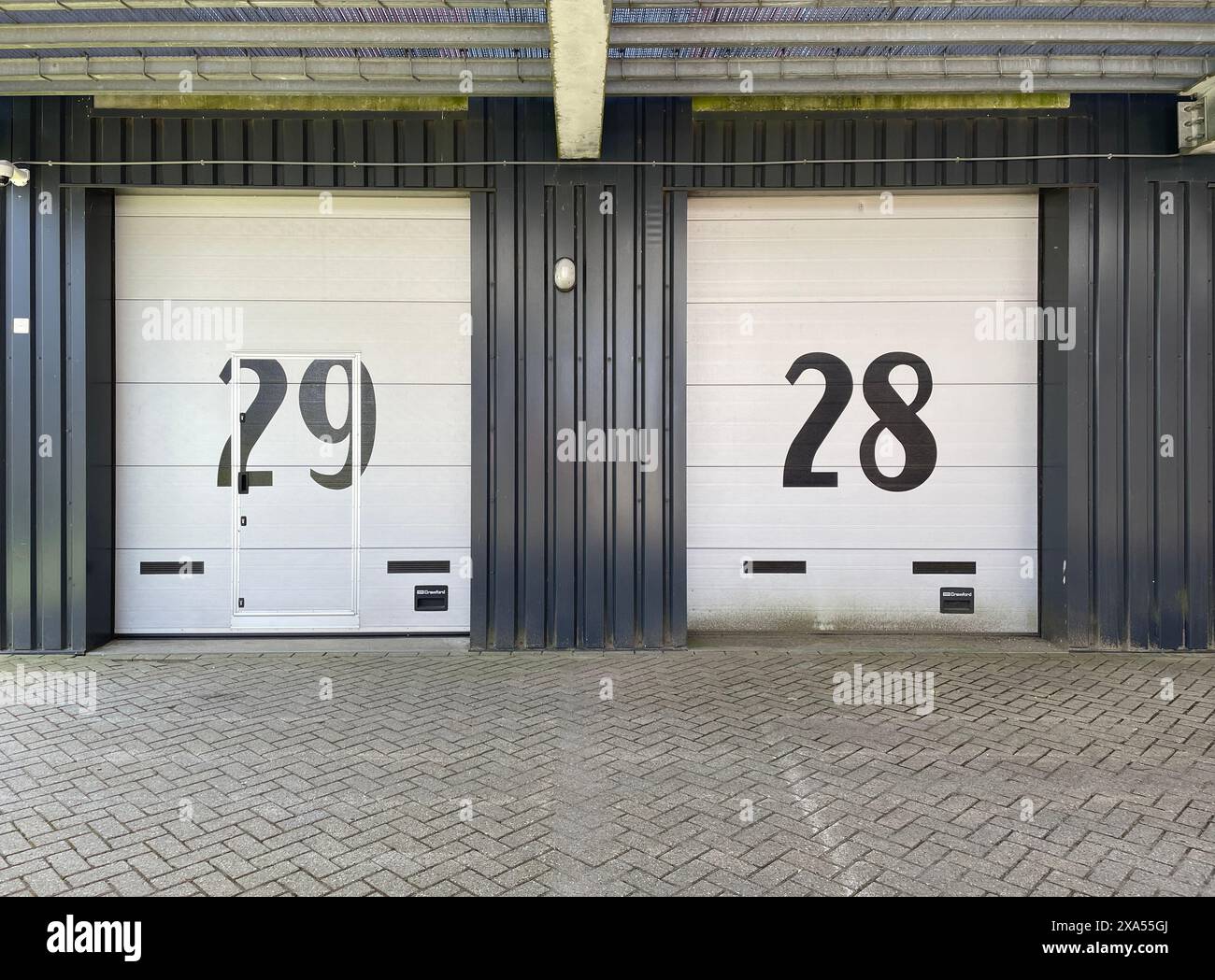 The large, numbered doors of storage units in Zutphen, the Netherlands ...