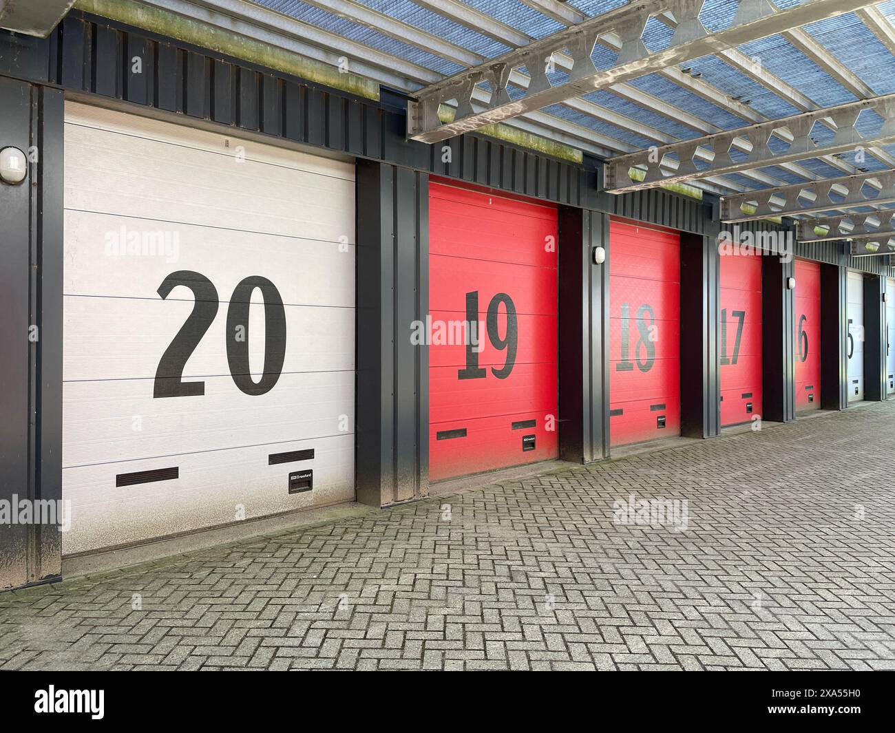 The large, numbered doors of storage units in Zutphen, the Netherlands ...