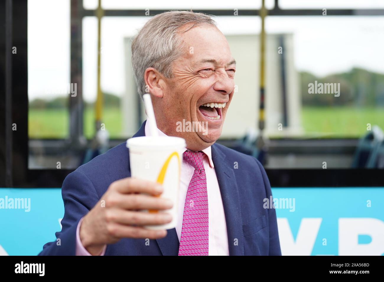 Leader of Reform UK Nigel Farage holding a McDonalds banana milkshake ...