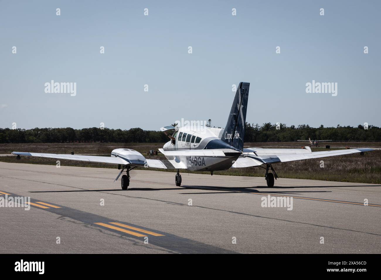 A small propeller plane operated by Cape Air taxiing prior to take off ...