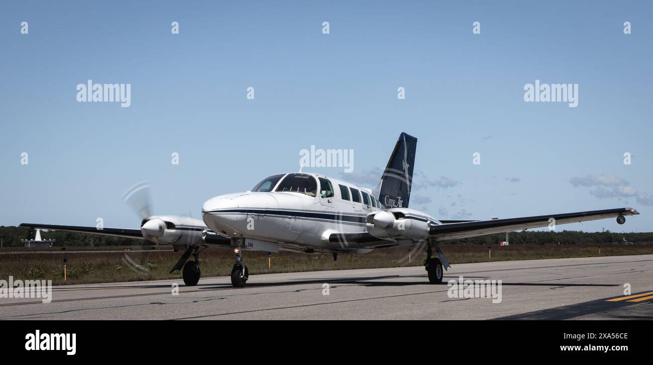 A small propeller plane operated by Cape Air taxiing prior to take off ...