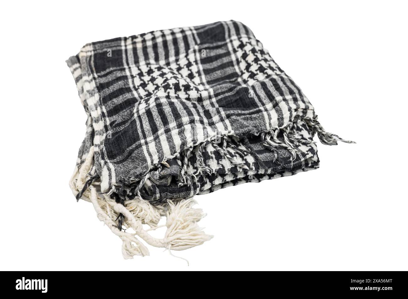 Detail of a folded Palestinian scarf on white background. Traditional ...