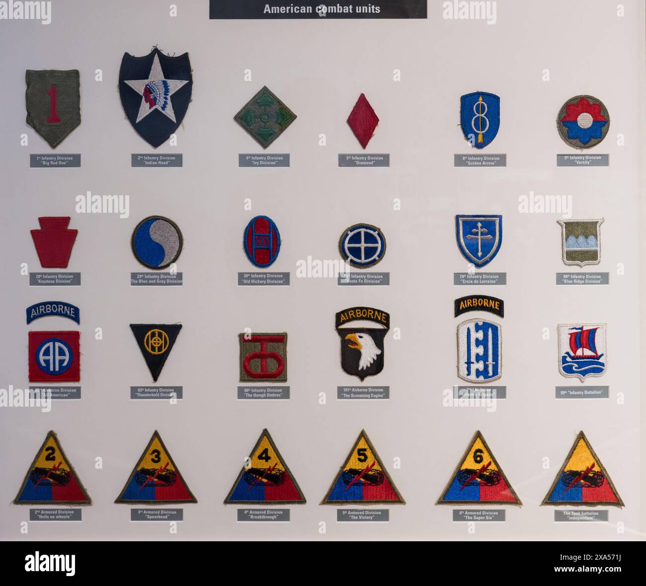 Detail of various distinctive patches of American combat units on white ...
