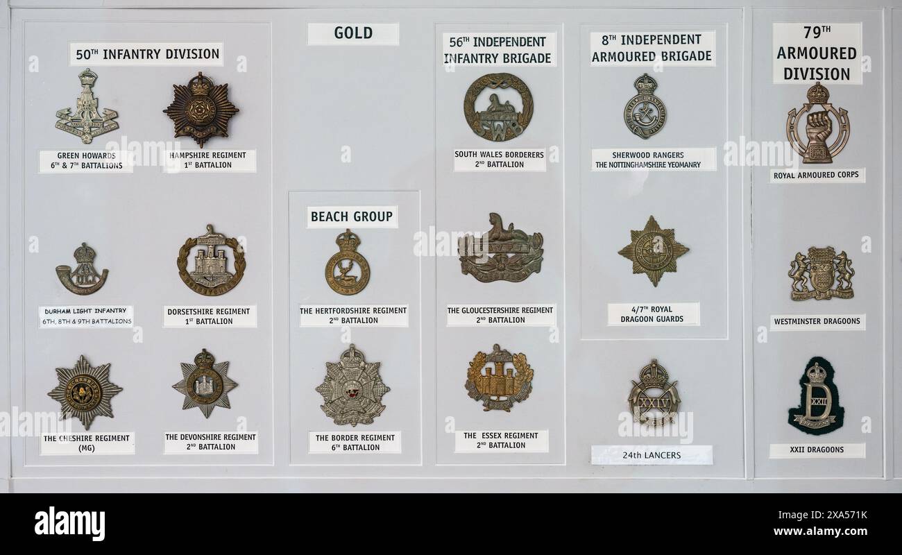 Detail of medals and badges from the second world war D-Day British cap ...