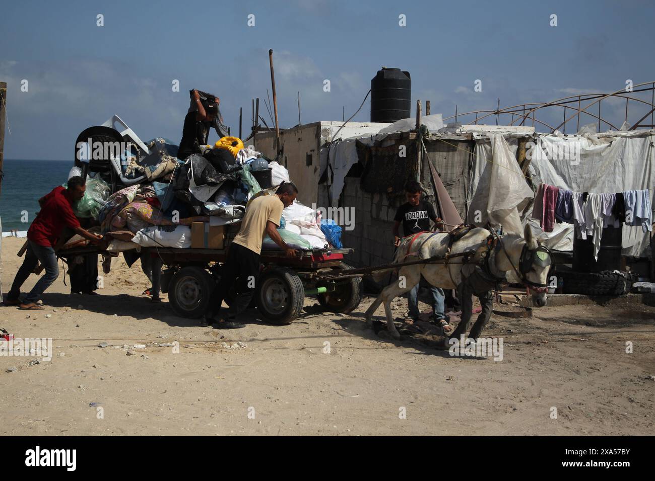 Gaza. 4th June, 2024. Palestinians who fled from Rafah arrive at a ...