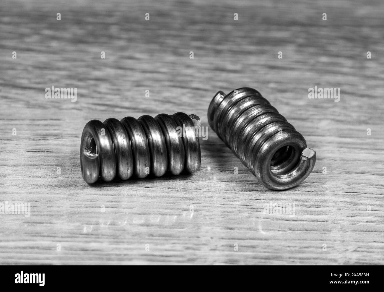 A close-up of two metallic springs, perfect for design Stock Photo - Alamy