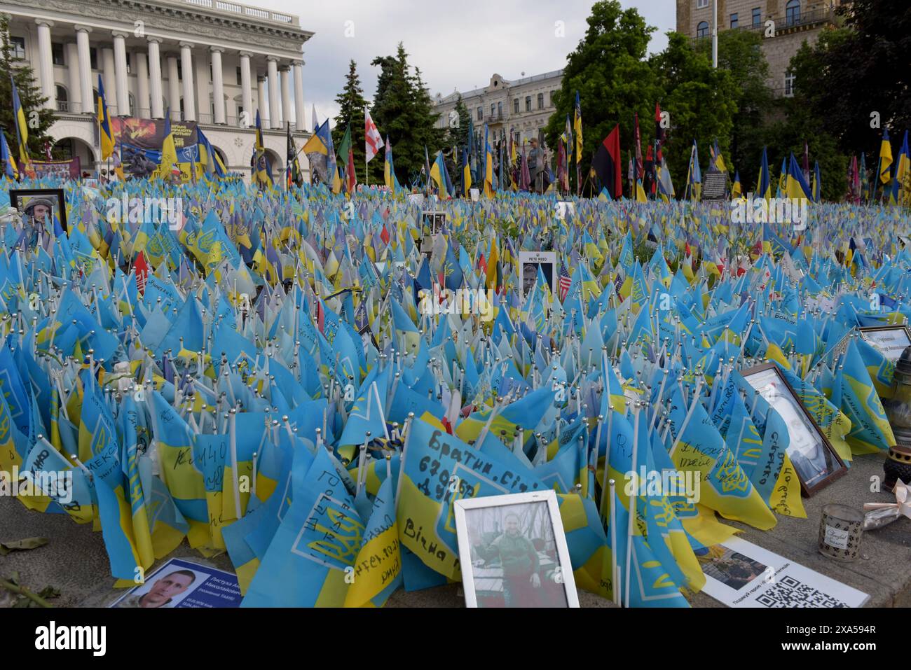 A huge memorial display of Ukrainian flags carrying names of fallen ...