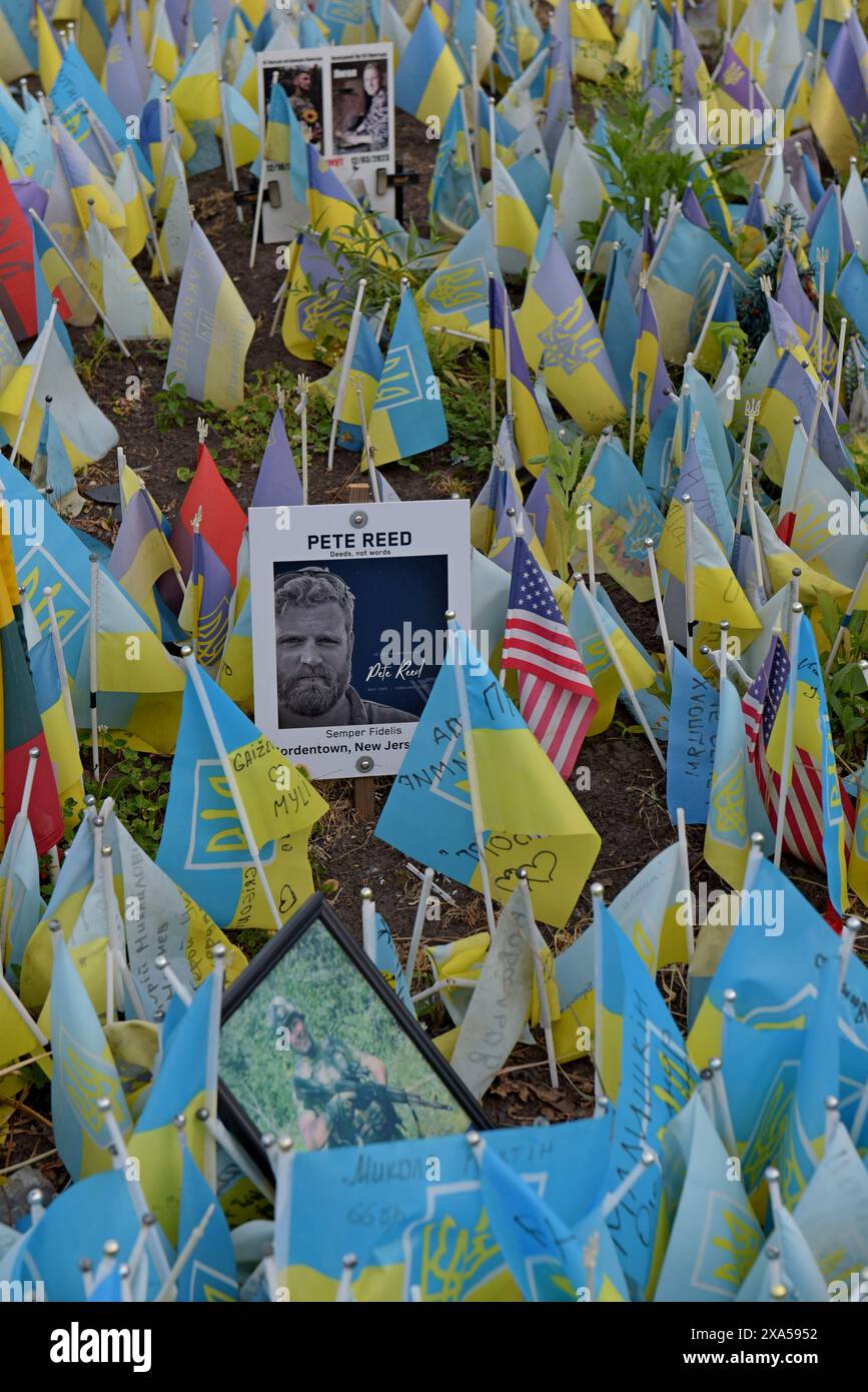A huge memorial display of Ukrainian flags carrying names of fallen ...
