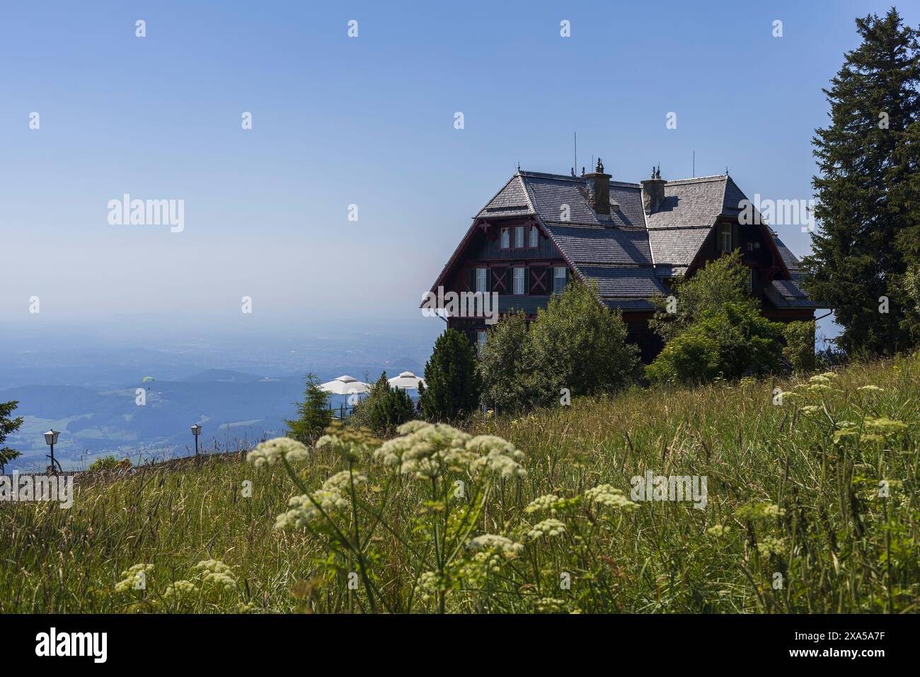 Photo of a traditional alpine house in Alpine mountains with panoramic ...