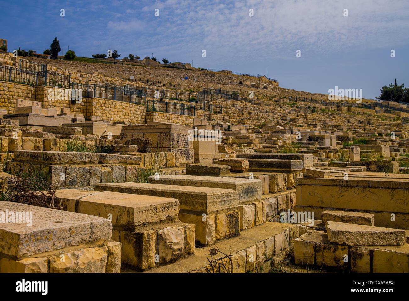 The stones placed on graves at an ancient cemetery on the Mount of ...