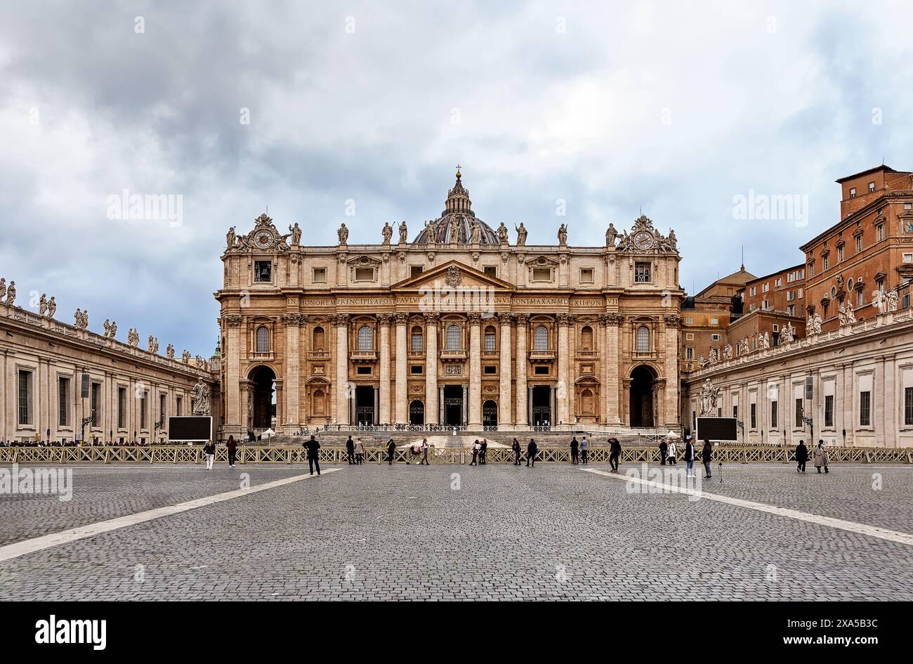 View of St. Peter's Basilica in the Vatican city against dramayic sky ...