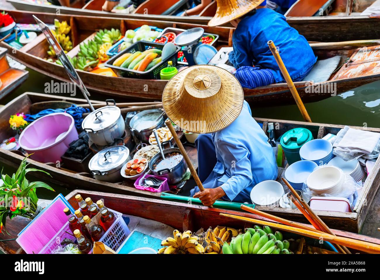 Traditional floating market in Damnoen Saduak near Bangkok, Thailand ...