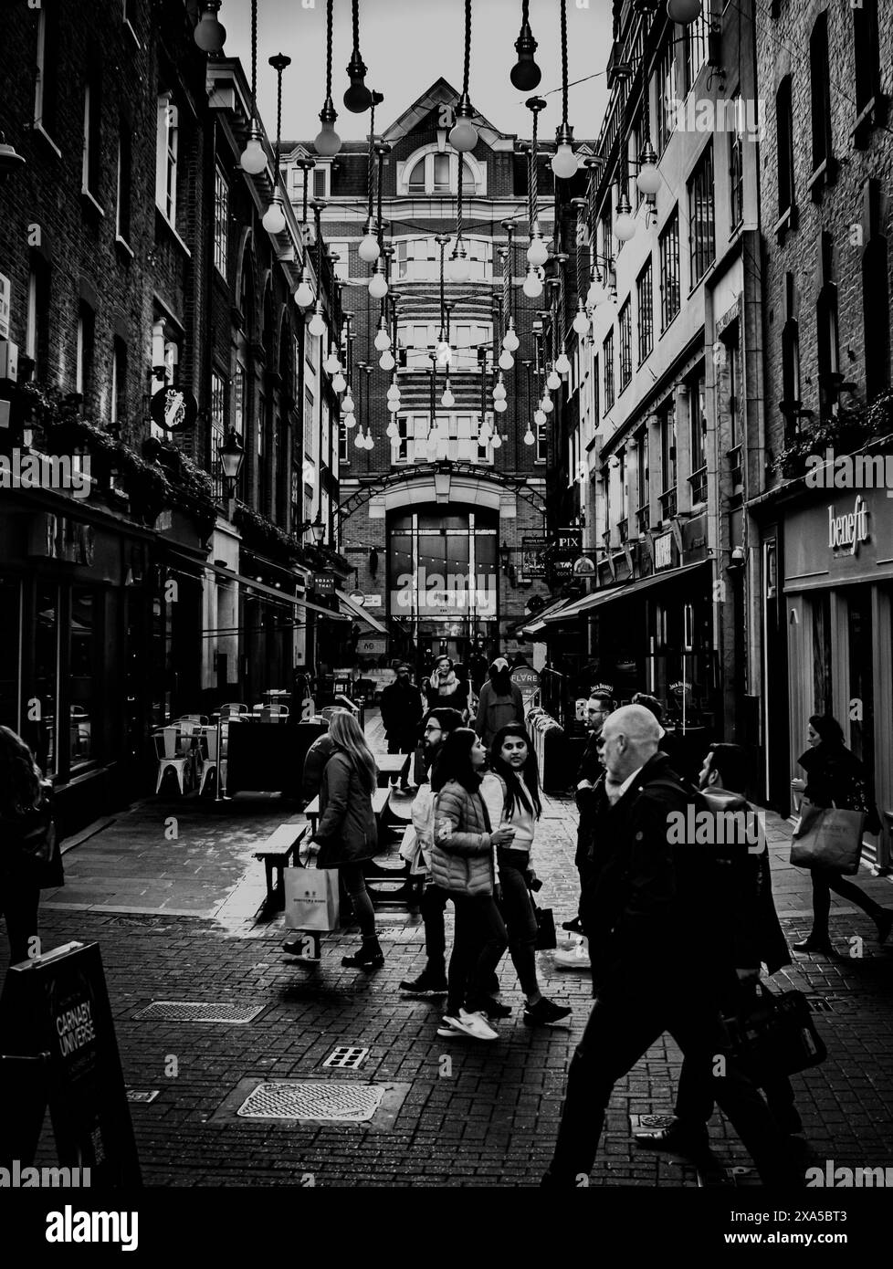 The narrow street of London, England in grayscale Stock Photo - Alamy